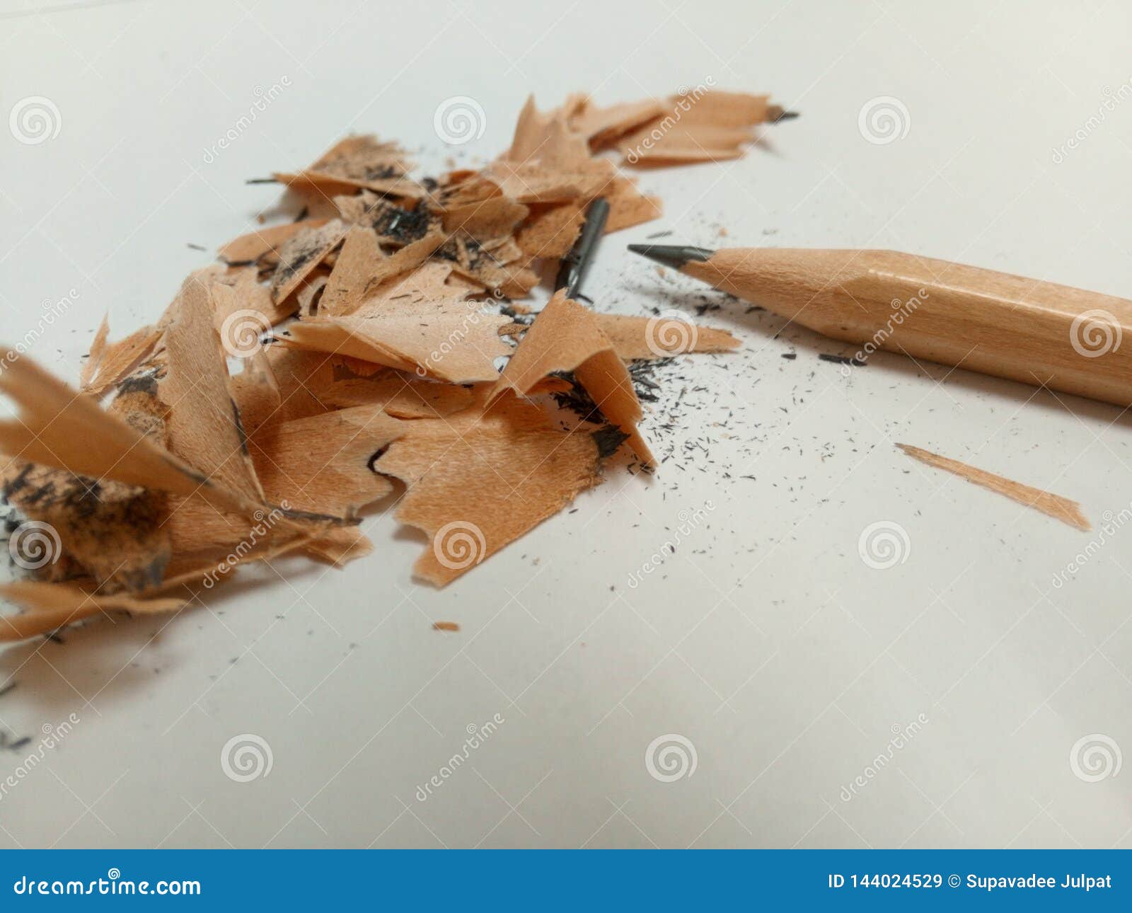 A Pencil and Some Pencil Sharving with Some Dust of Graphite are on ...