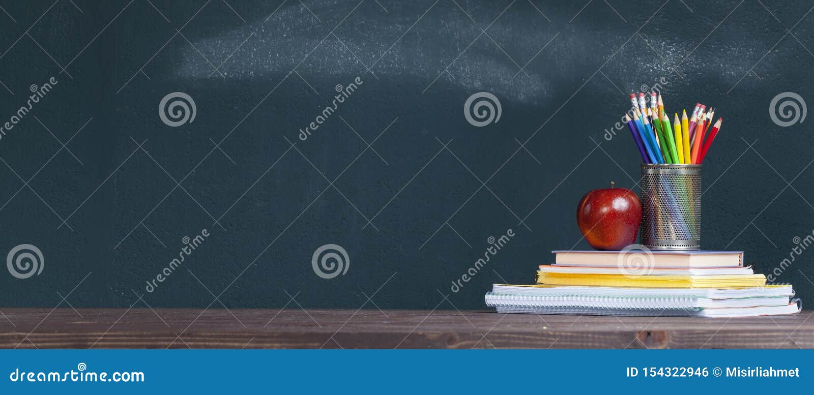 Pencil Tray and an Apple on Notebooks on School Teacher`s Desk Stock ...