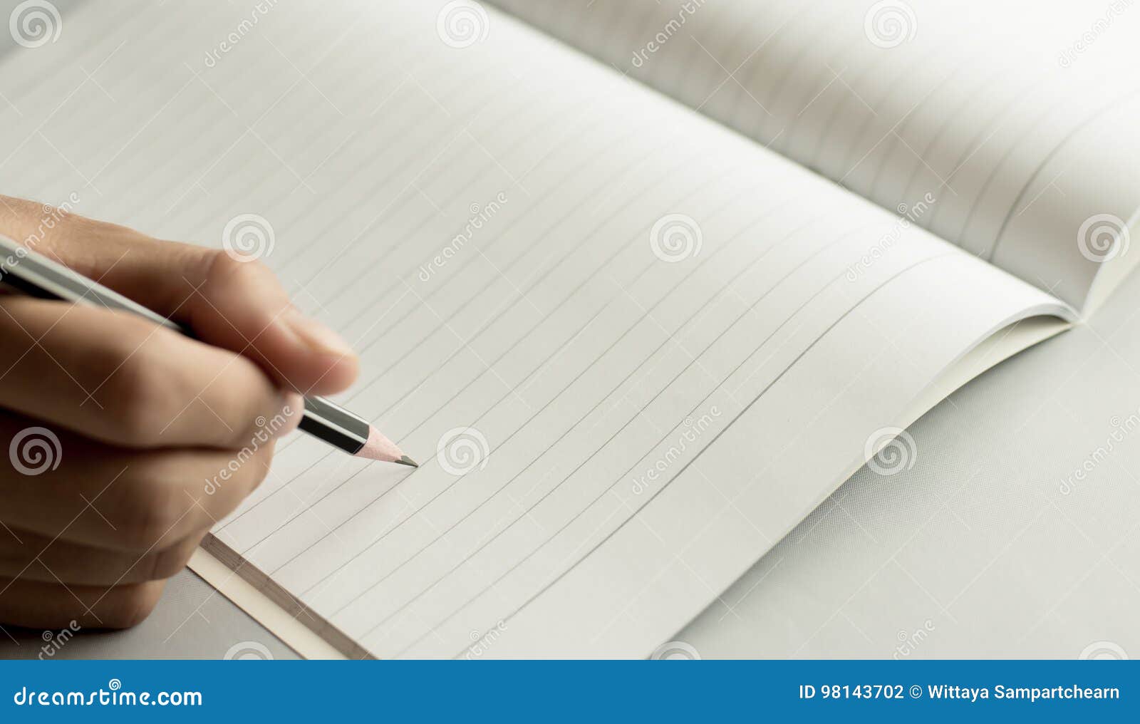 Pencil write on notebook stock photo. Image of pencil - 98143702