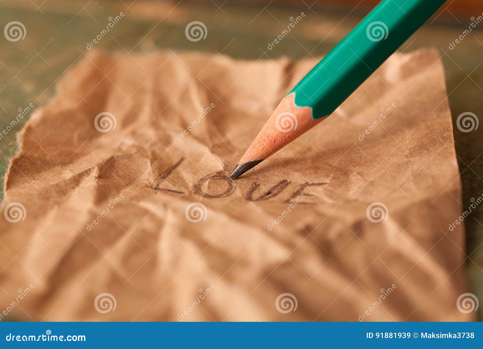 The Pencil Writes the Word Love on a Paper Stock Image - Image of ...