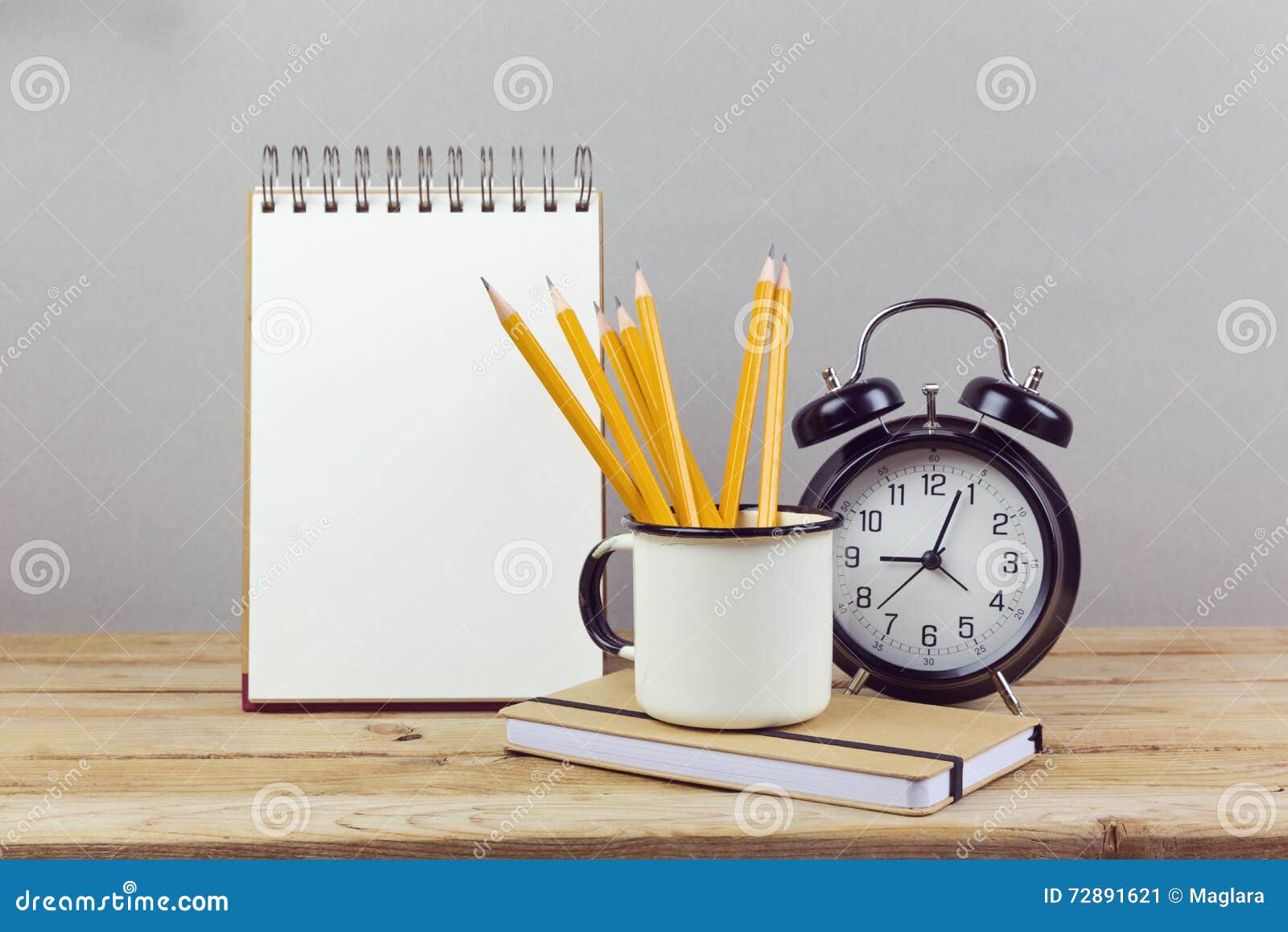 Pencils, Alarm Clock and Notebook on Wooden Table. Business Planning ...