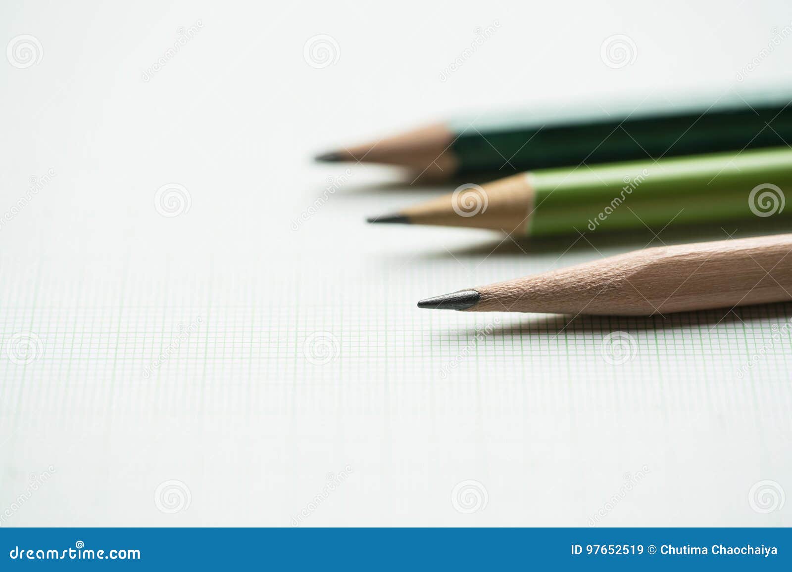 Pencils on graph paper stock image. Image of grid, freehand - 97652519