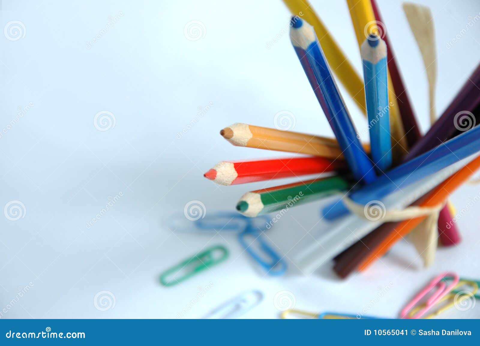 Pencils with paper clips stock image. Image of varicoloured - 10565041