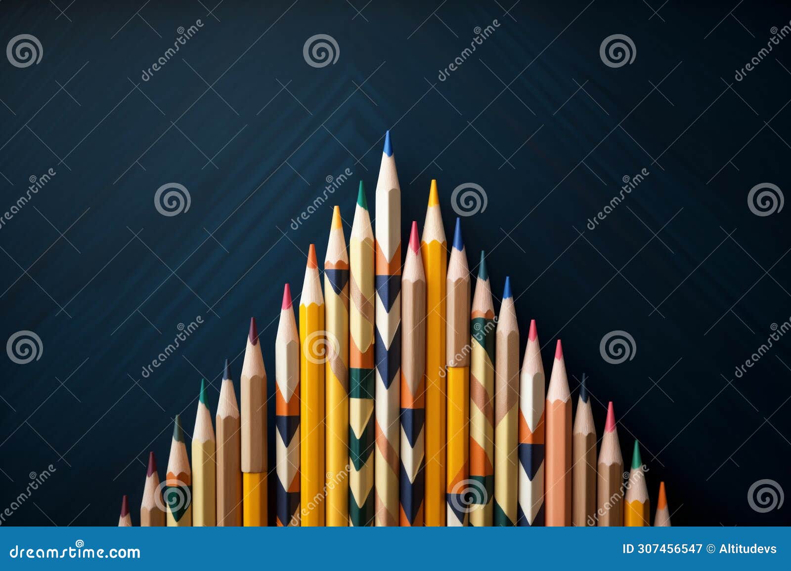 Pencils Stacked in Pyramid Pattern on a Dark Surface Stock Image ...