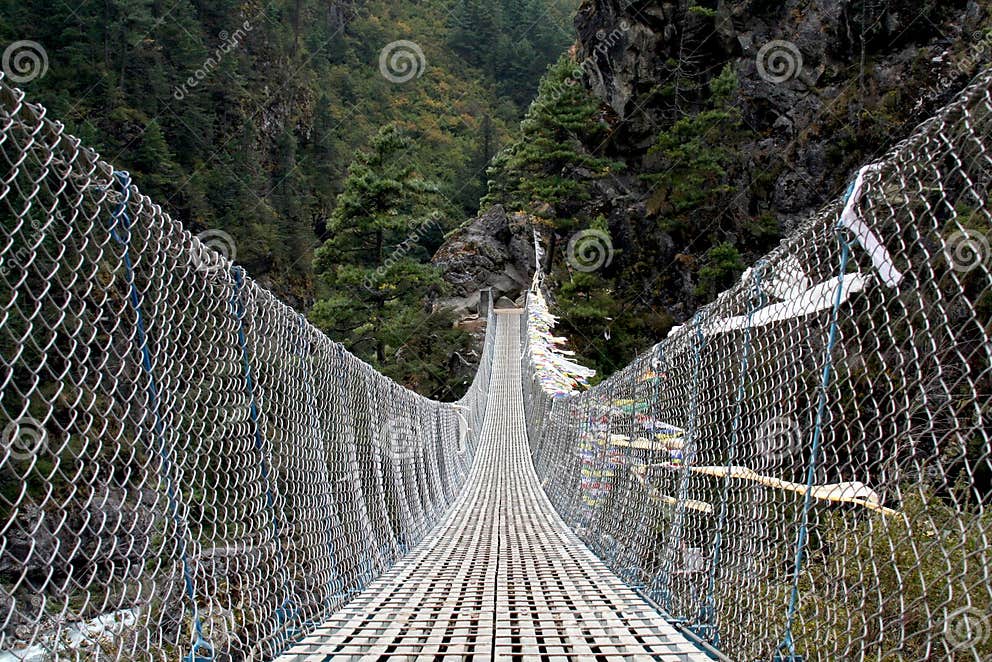 Pendant Bridge with Buddhist Prayer Flags Stock Image - Image of mount ...