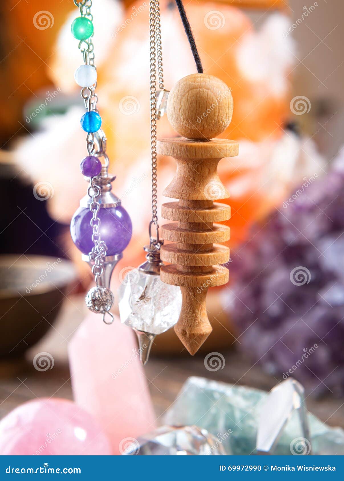 Pendulum and crystals stock photo. Image of measurement - 69972990