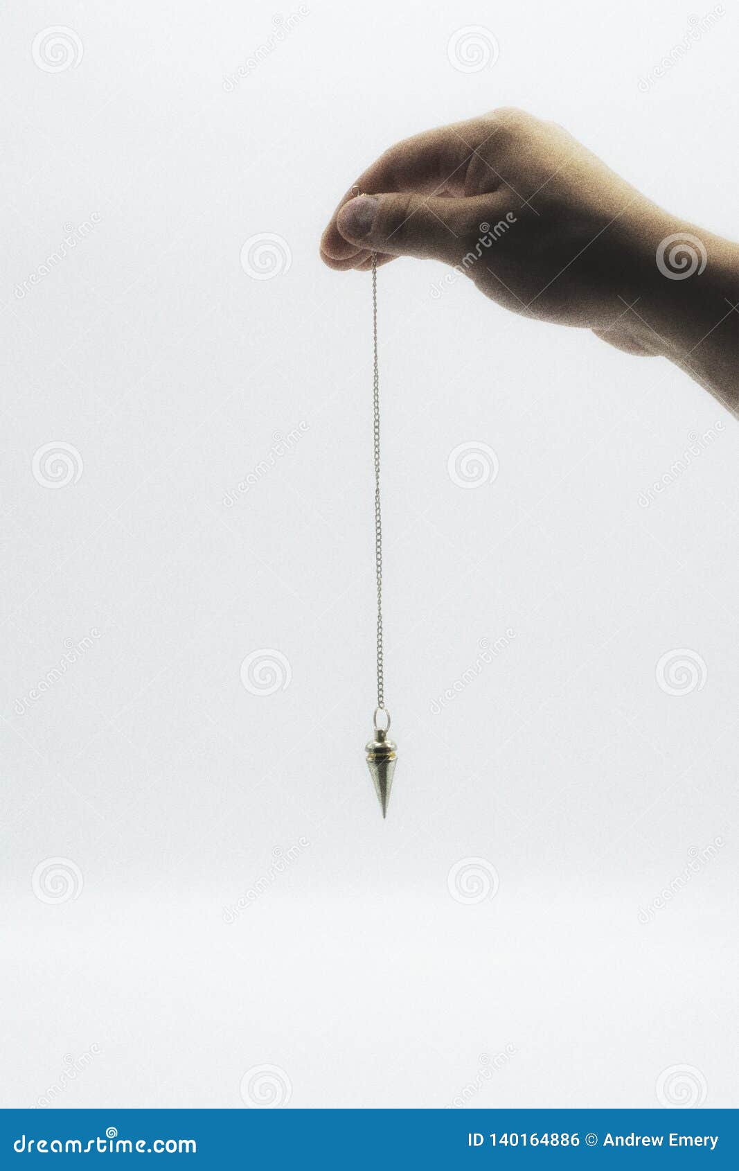 Pendulum Dowsing On An Isolated White Background With An Blue Crystal ...
