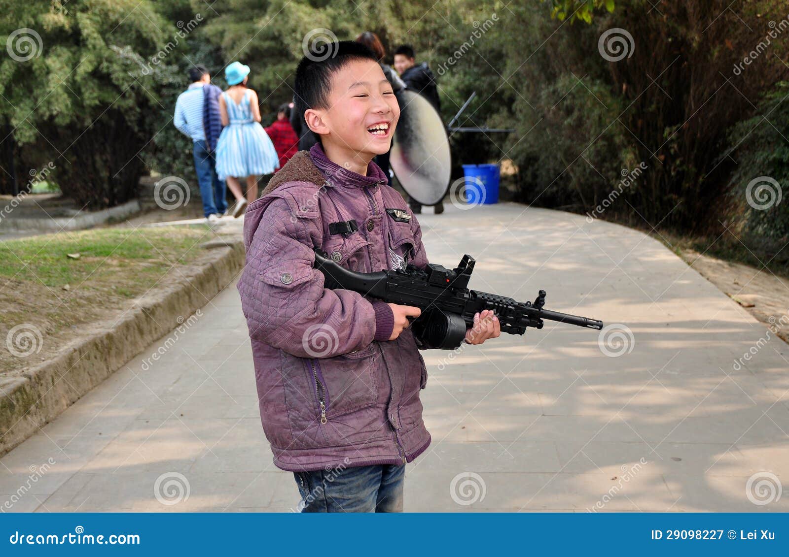 Pengzhou, China: Little Boy with Toy Gun Editorial Photography - Image ...