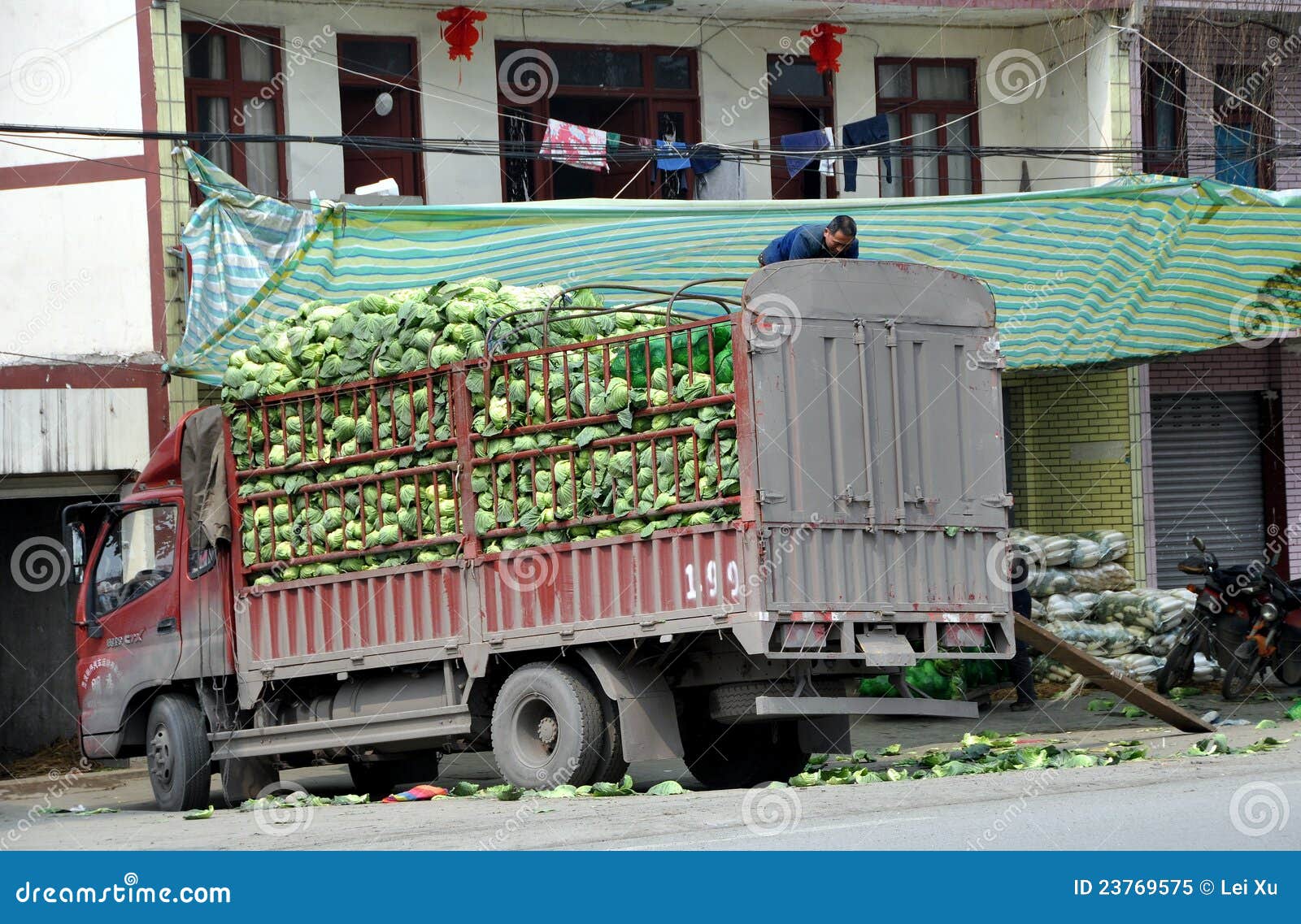 Pengzhou, China: Man Loading Truck Editorial Image - Image of transport ...