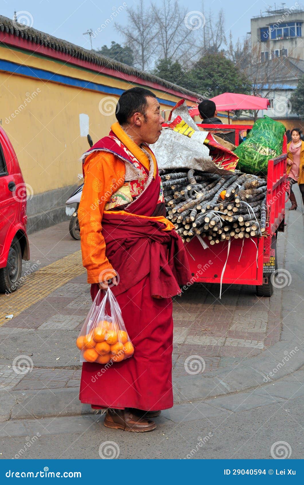 Pengzhou, China: Tibet Monk with Oranges Editorial Stock Image - Image ...