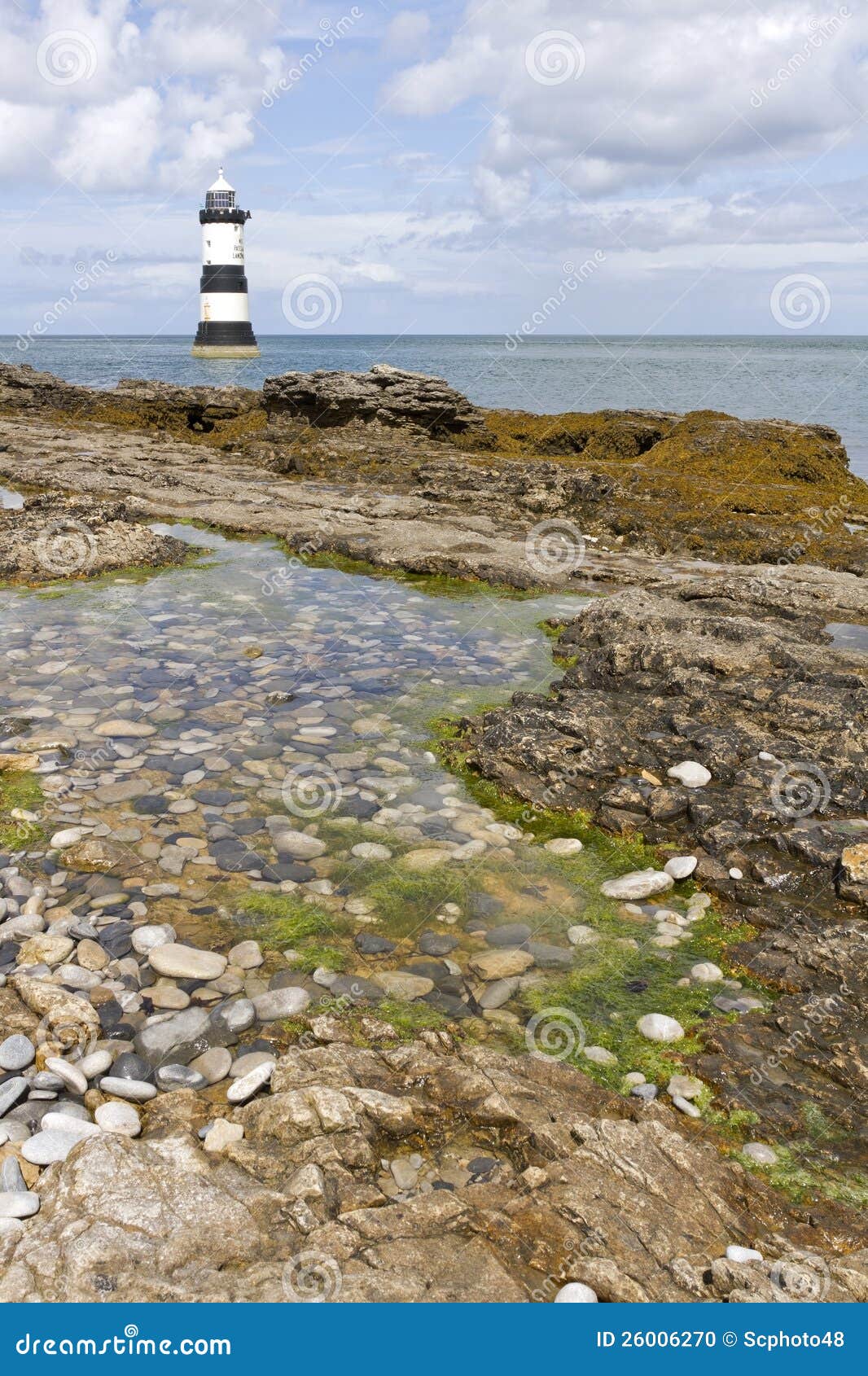 Penmon Point Lighthouse stock photo. Image of clouds - 26006270