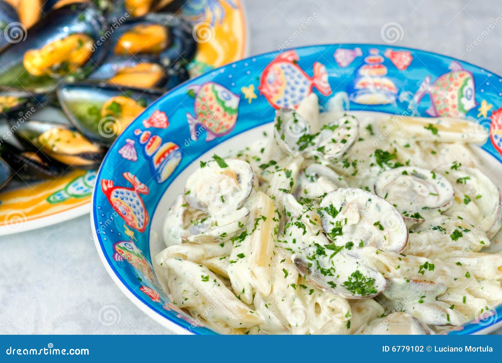 Penne Em Barca (Penne Com Leite E Moluscos) Foto de Stock - Imagem de ...