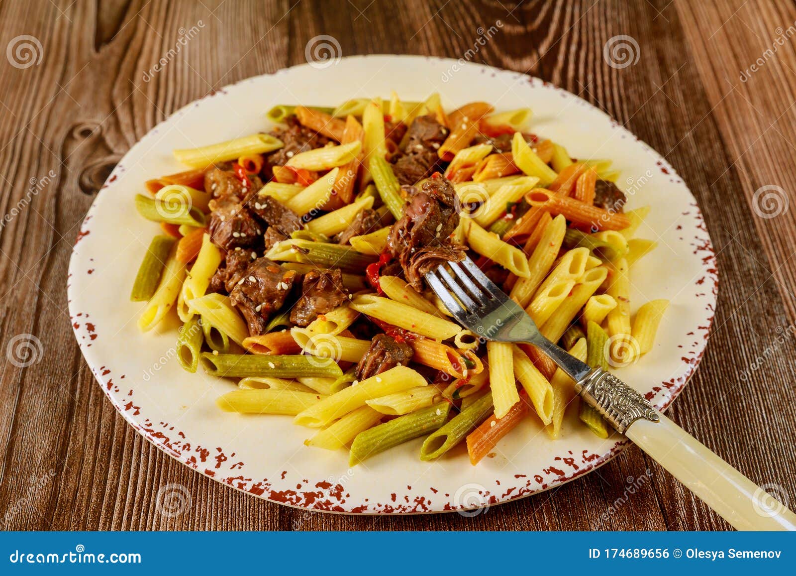 Penne Pasta with Beef and Bolognese Sauce and Vegetable in Plate with ...