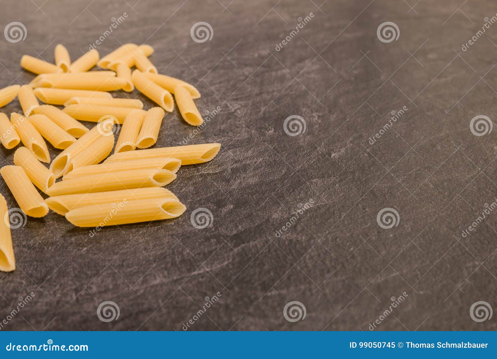 Penne Rigate Macaroni Pasta on Grey Working Surface Stock Image - Image ...