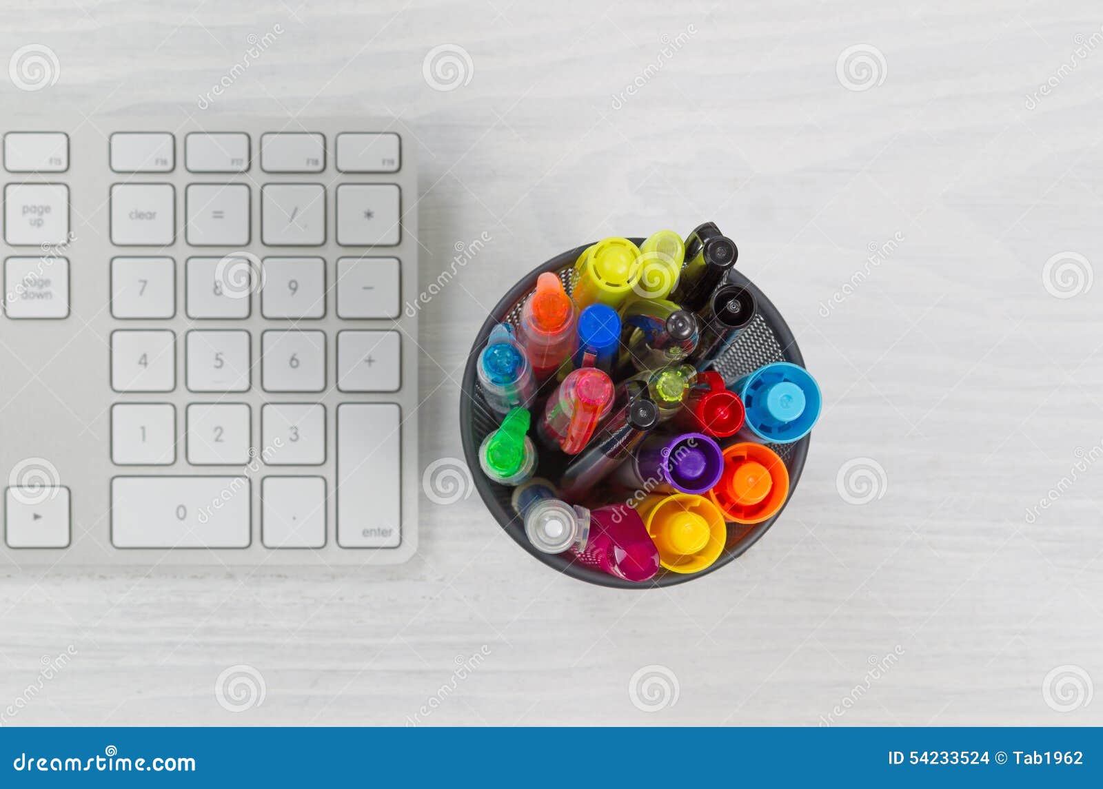 Pens and Markers in Container on Top of Desk Stock Photo - Image of ...