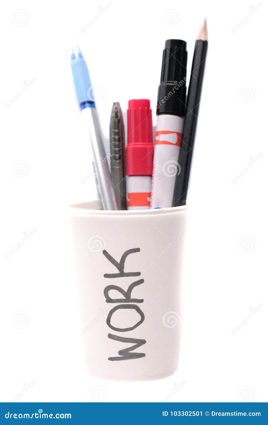 Pencils And Pens In A Cup