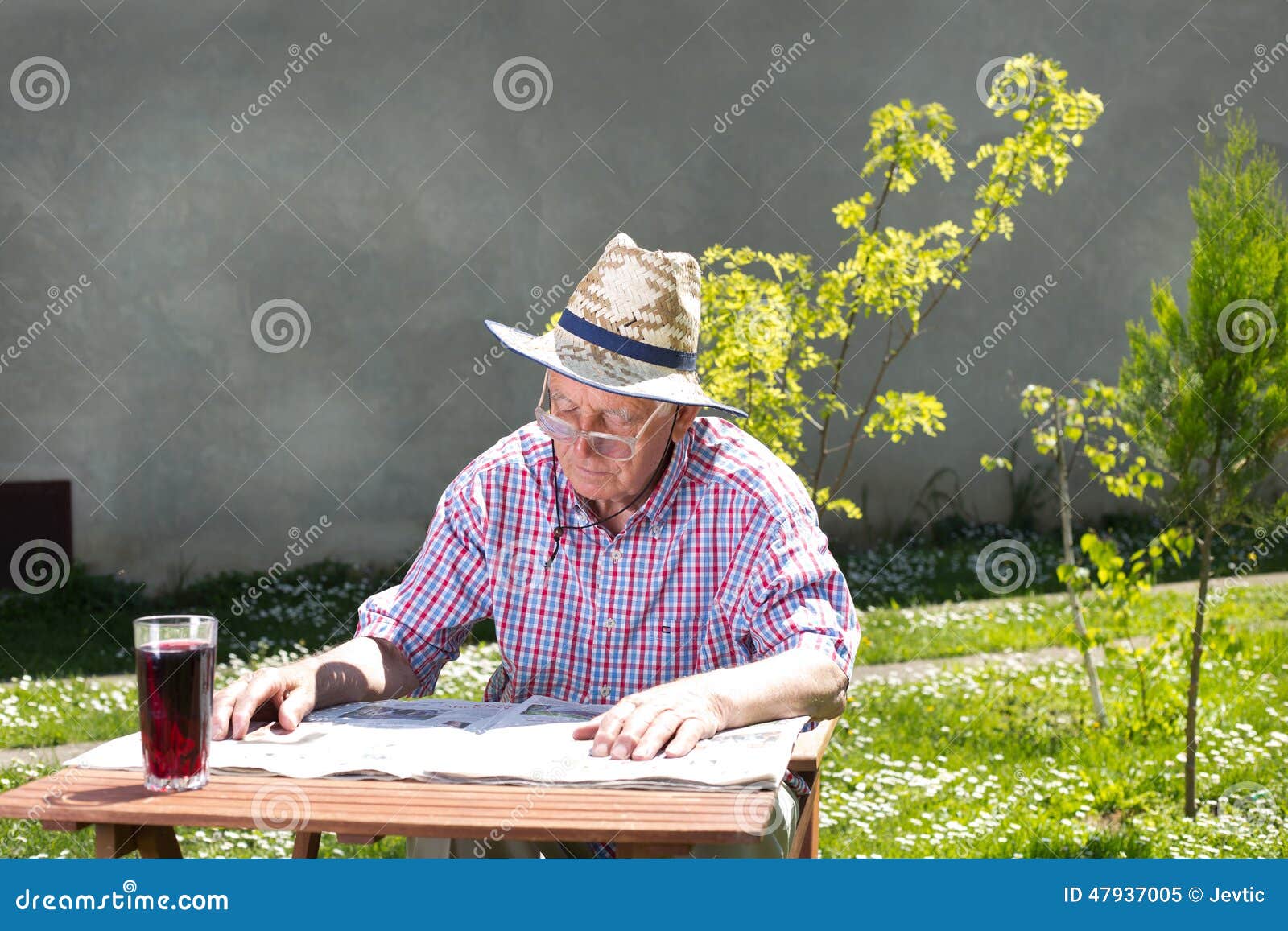 Pensioner with newspaper stock image. Image of expression - 47937005