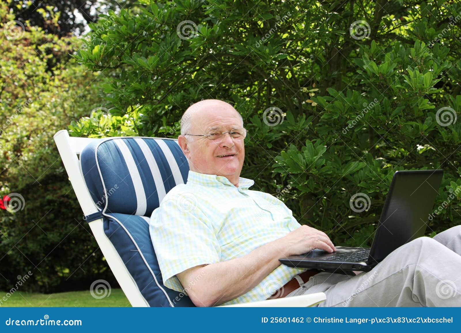 Pensioner Using Laptop in Garden Stock Photo - Image of home, senior ...