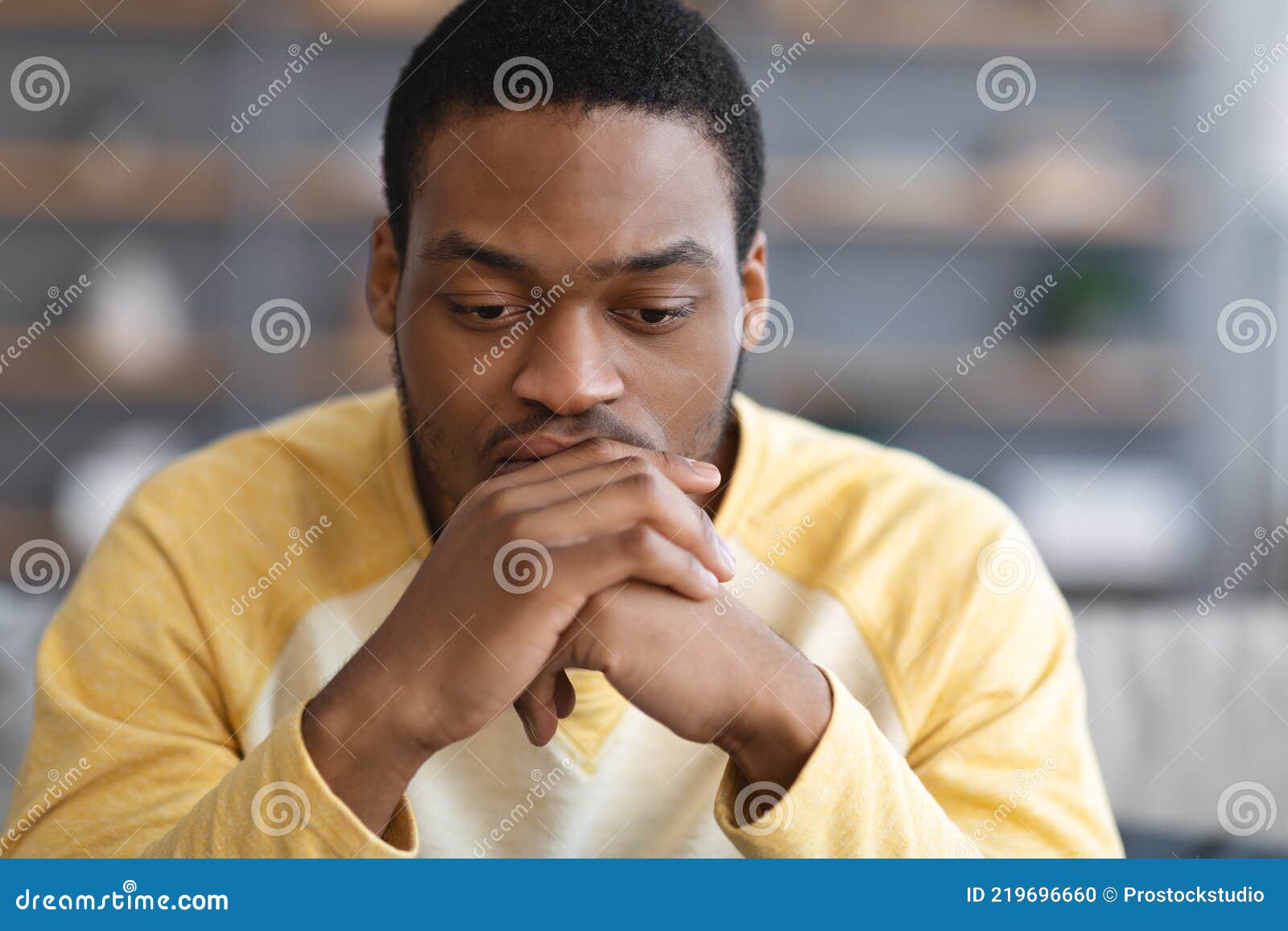 Pensive African American Man Thinking about Something Stock Photo ... Pensive African American Man Thinking about Something Stock Photo ...