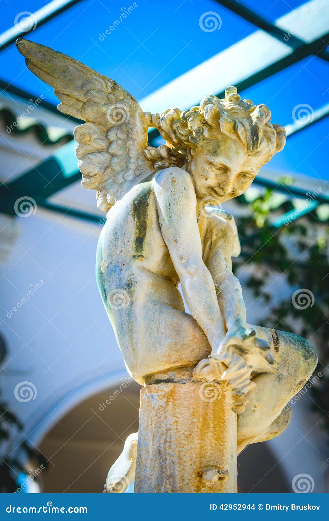 Pensive angel sitting stock photo. Image of cupid, child - 42952944