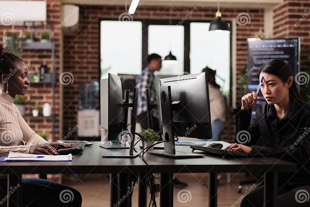 Pensive Asian Tech Programmer Working on Code Development Stock Image - Image of employee, code ...
