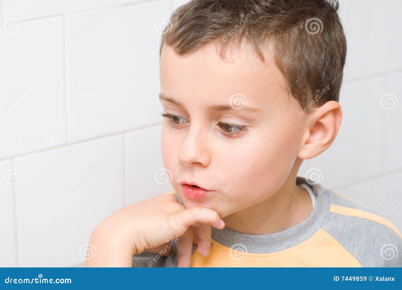 Pensive boy stock image. Image of pretty, staring, close - 7449859