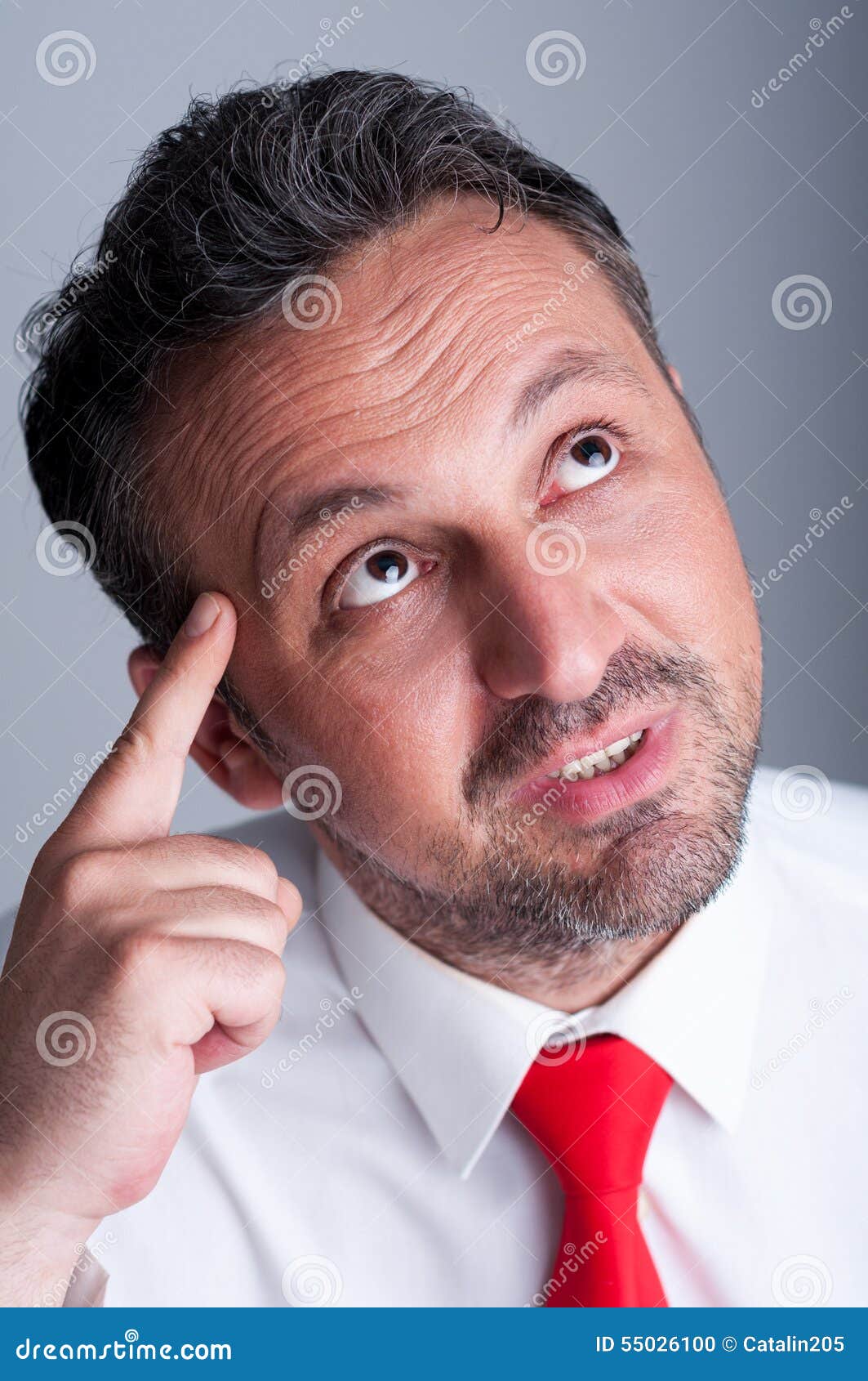 Pensive Business Person Having an Idea Stock Photo - Image of grey ...