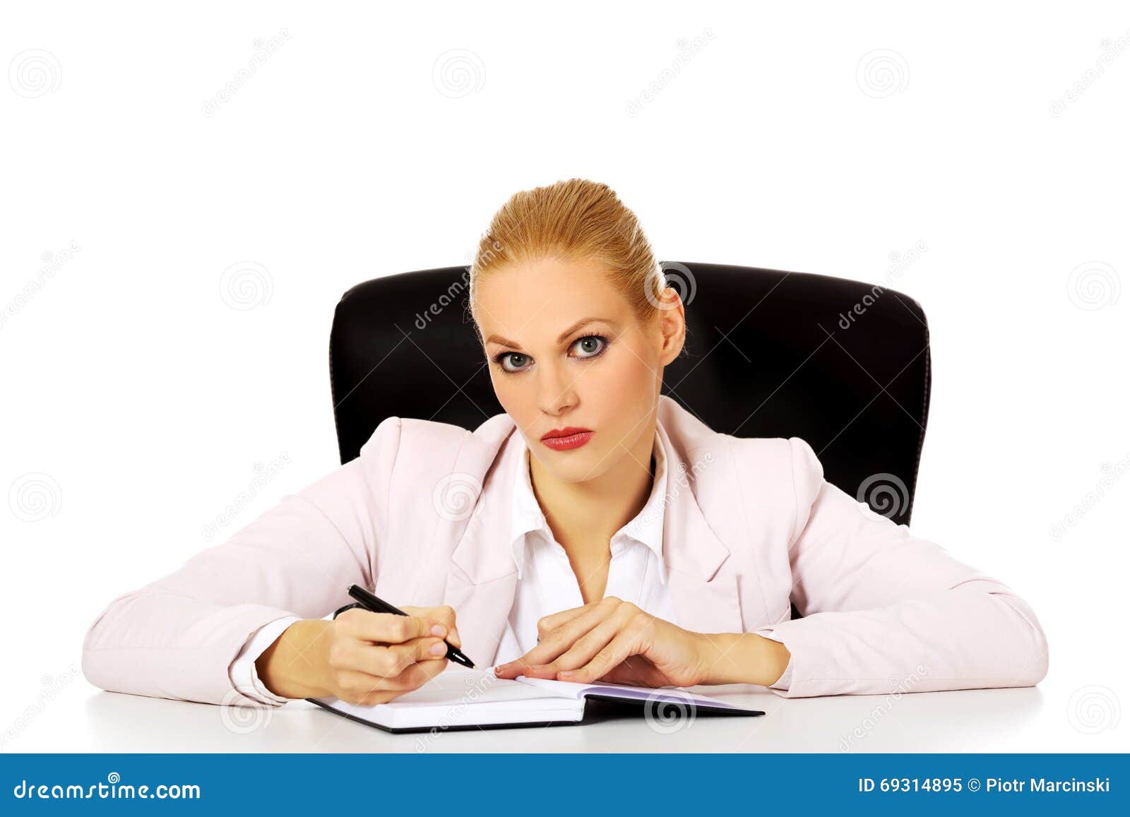 Pensive Business Woman Taking Notes Behind the Desk Stock Image - Image ...