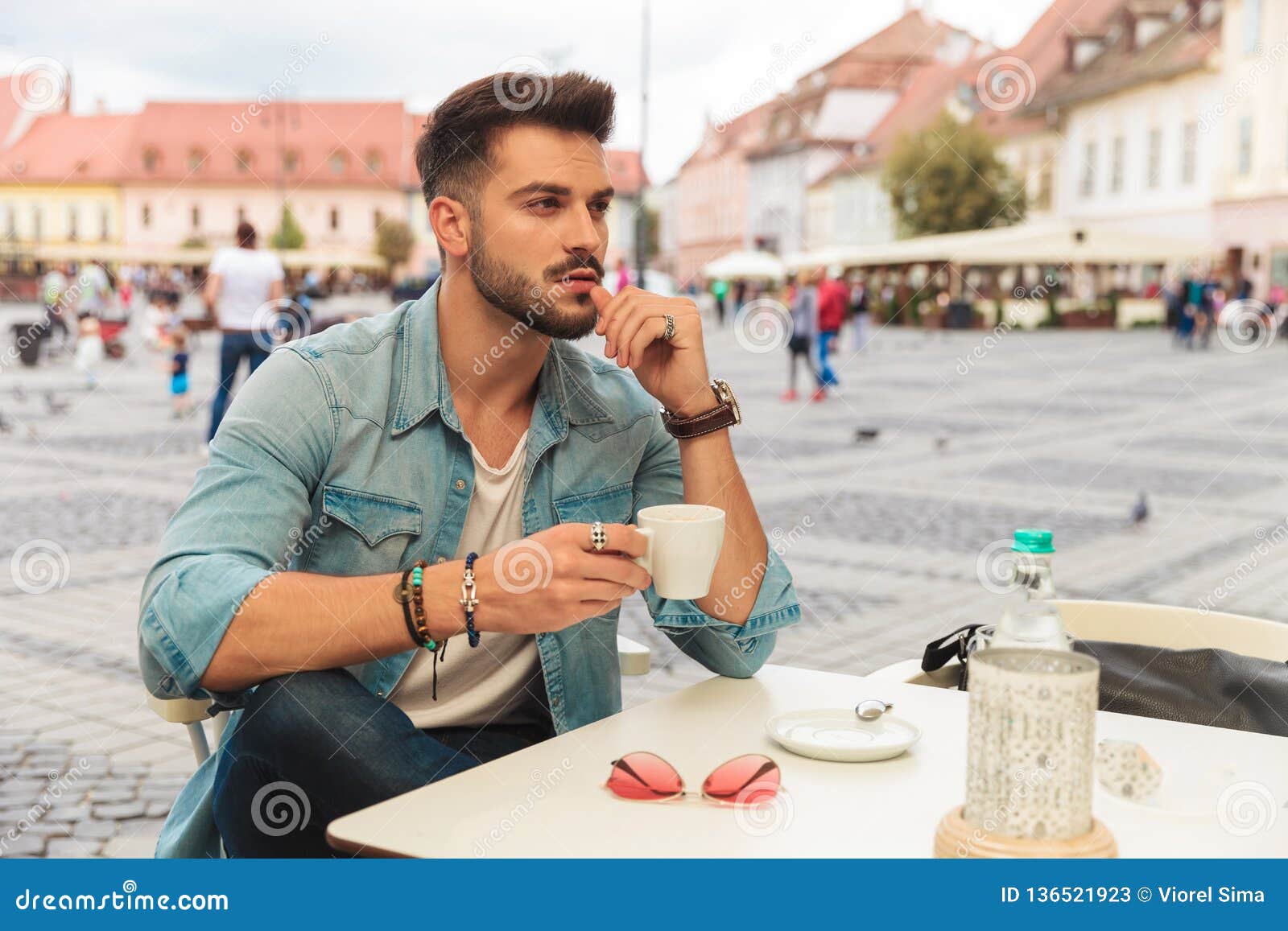 Pensive Casual Man Taking a Coffee Break while Sitting Stock Image ... Pensive Casual Man Taking a Coffee Break while Sitting Stock Image ...