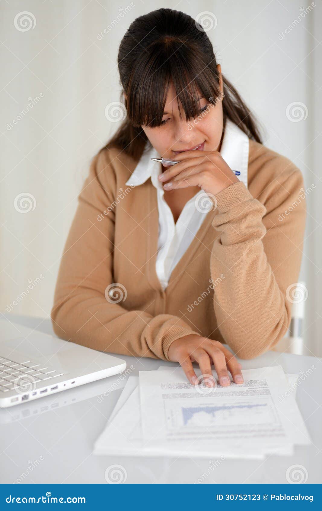 Pensive Charming Young Woman Reading Documents Stock Image - Image of ...