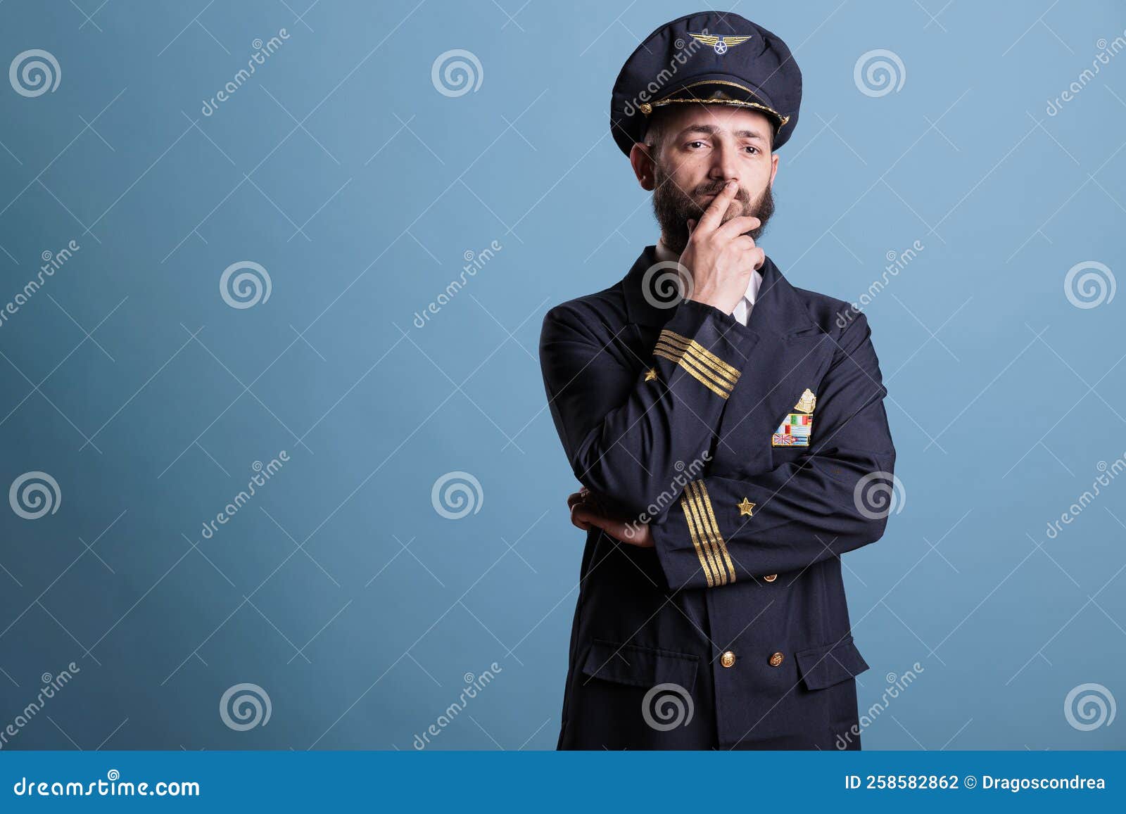 Pensive Confused Airline Pilot in Uniform Questioning Stock Photo ...