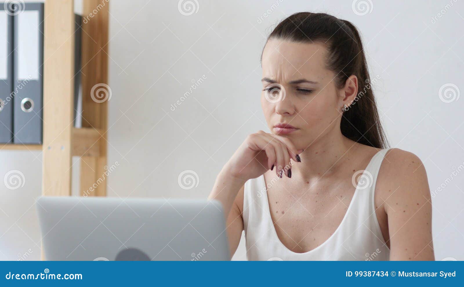 Pensive Creative Woman Working, Thinking and Planning at Work in Office ...