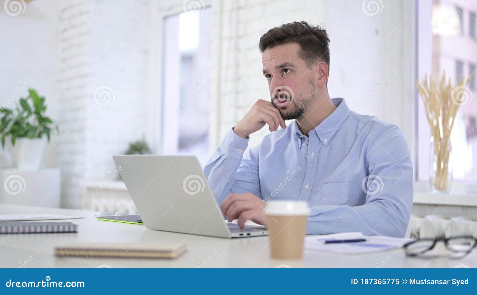 Pensive Creative Young Man Thinking at Work Stock Image - Image of ...