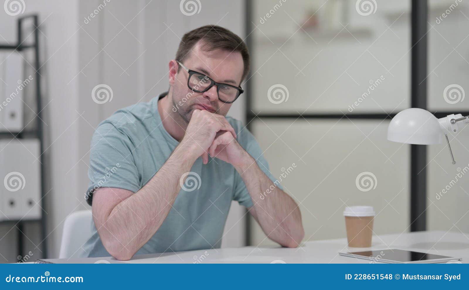 Pensive Young Man Thinking at Work Stock Photo - Image of working ...
