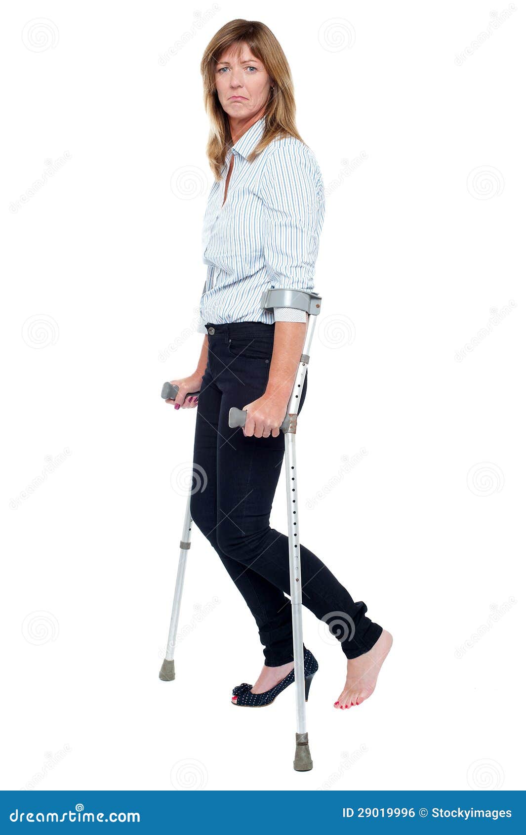 Pensive Looking Woman Using Crutches To Walk Stock Photo - Image of ...