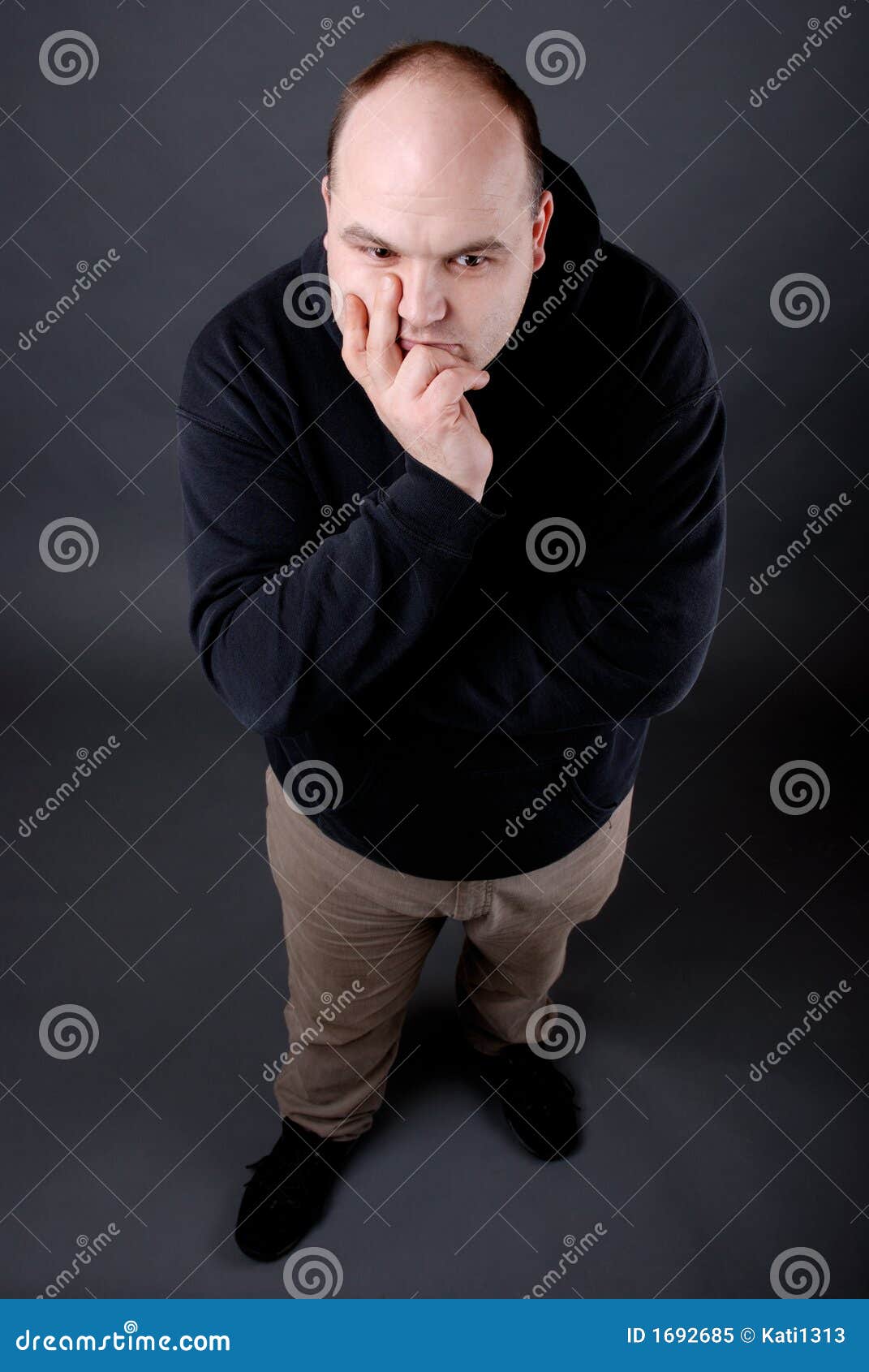 Pensive man stock image. Image of thoughtful, standing - 1692685