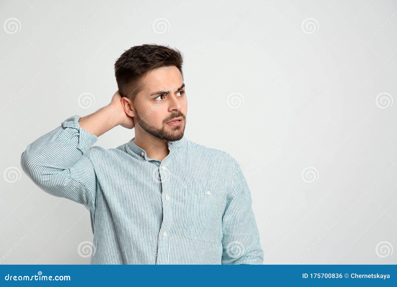 Pensive Man on Light Background. Thinking about Answer To Question ...