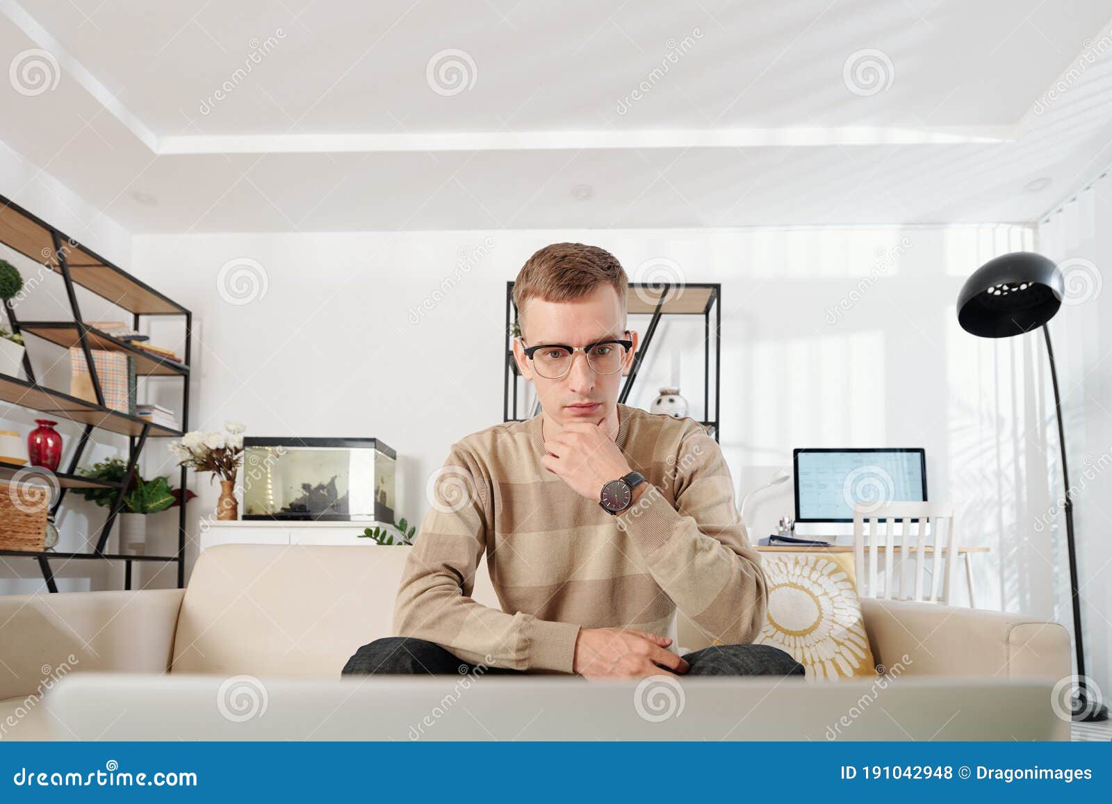 Pensive Man Reading Article Stock Photo - Image of lockdown, watching ...
