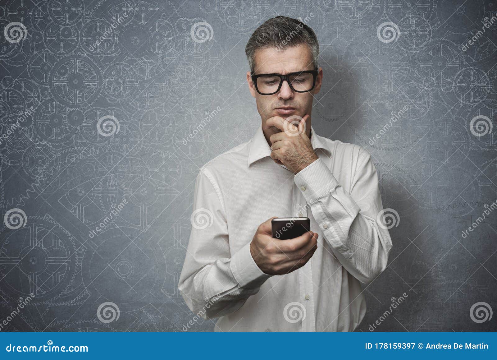 Pensive Man Using His Smartphone Stock Image - Image of connecting ... Pensive Man Using His Smartphone Stock Image - Image of connecting ...