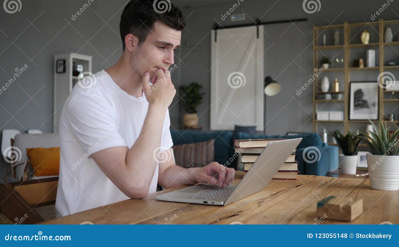 Pensive Man Thinking and Working on Laptop Stock Photo - Image of ...