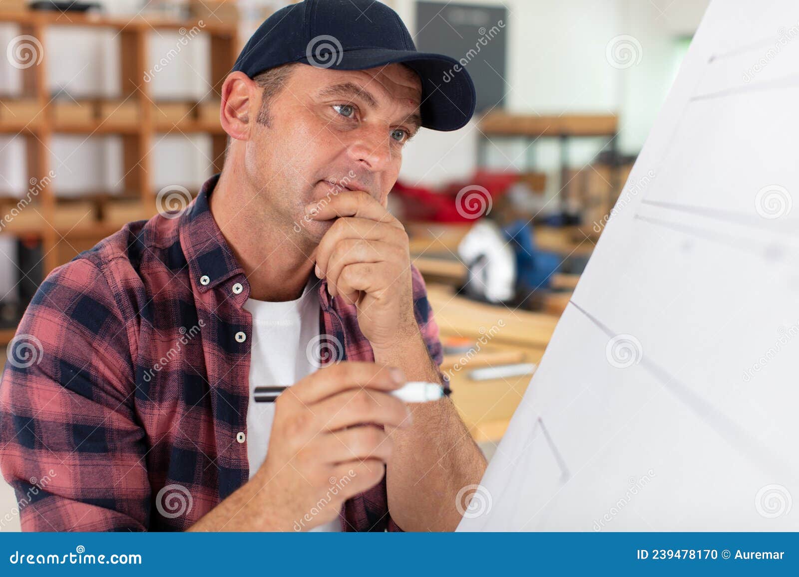 Pensive Middle-aged Workman Planning in Workshop Stock Photo - Image of ...