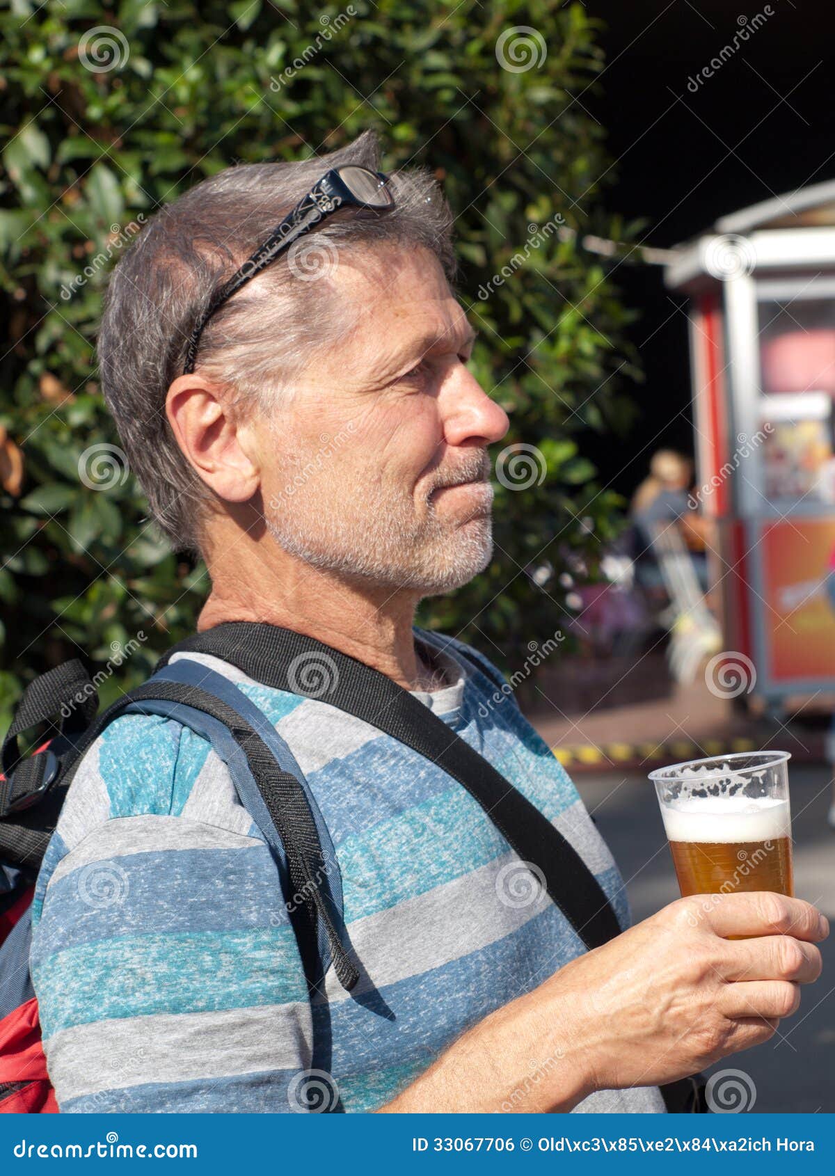 Pensive old man with beer stock photo. Image of tranquility - 33067706
