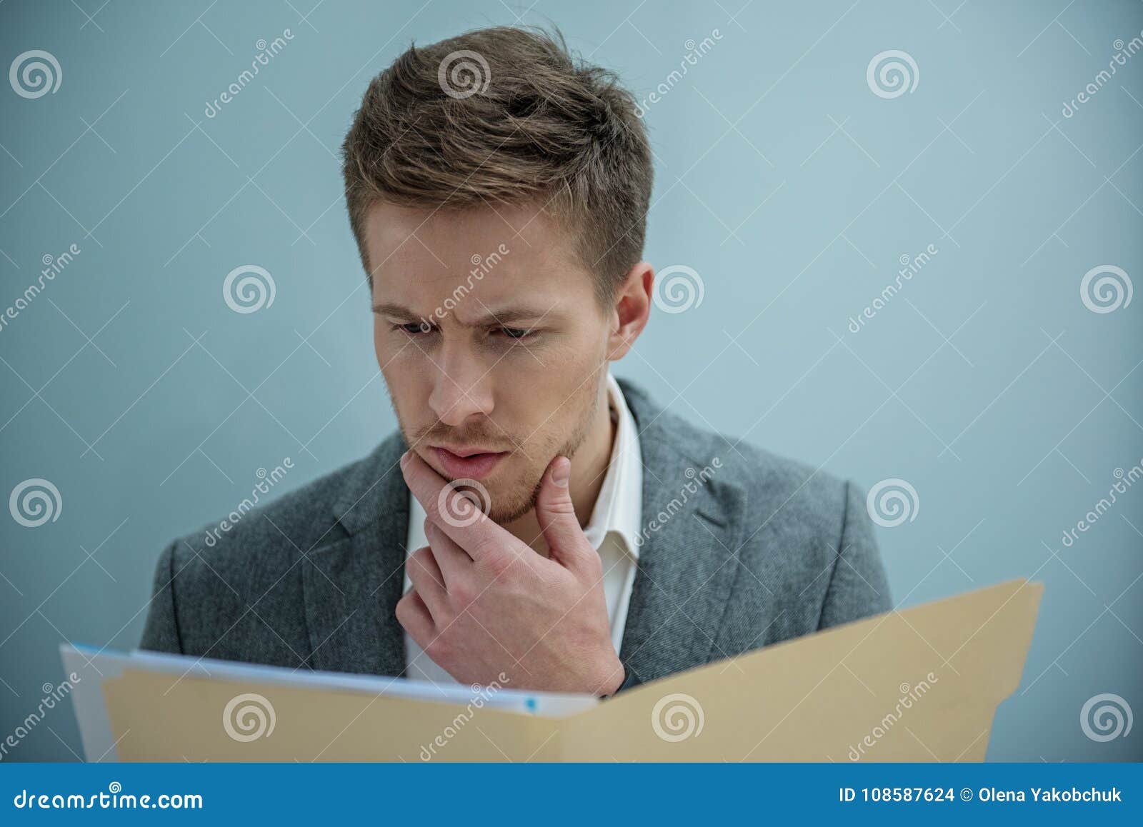 Pensive Professional Employee is Holding Documents Stock Photo - Image ...