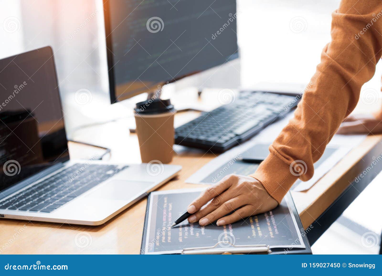 Pensive Programmer Working On On Desktop Pc Programming Code Technologies Or Website Design At