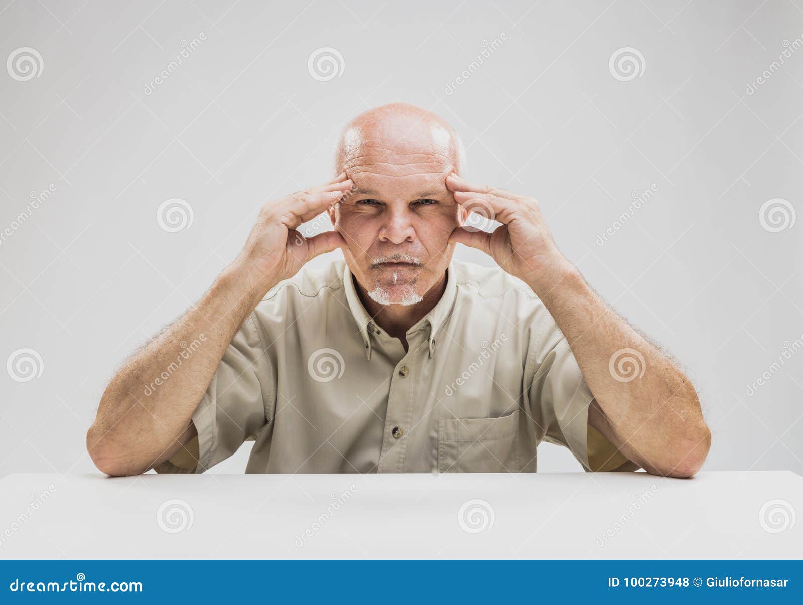 Pensive Senior Man with a Focused Expression Stock Photo - Image of ...