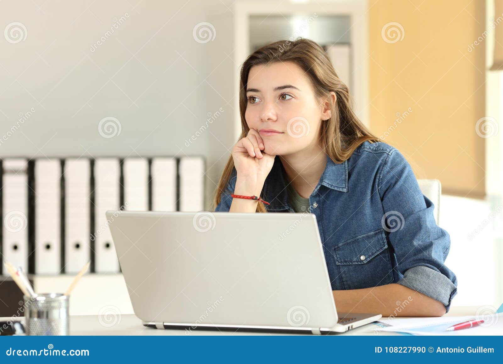 Pensive Intern Working at Office Stock Photo - Image of businesswoman ...