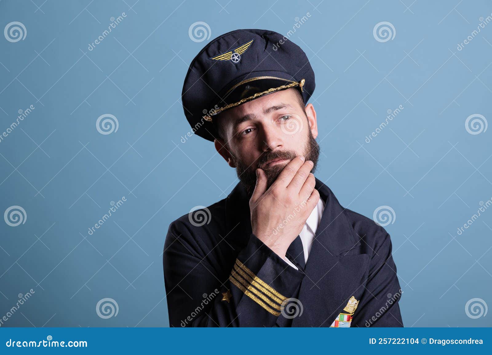 Pensive Thoughtful Airline Capitan in Uniform Questioning Stock Photo ...