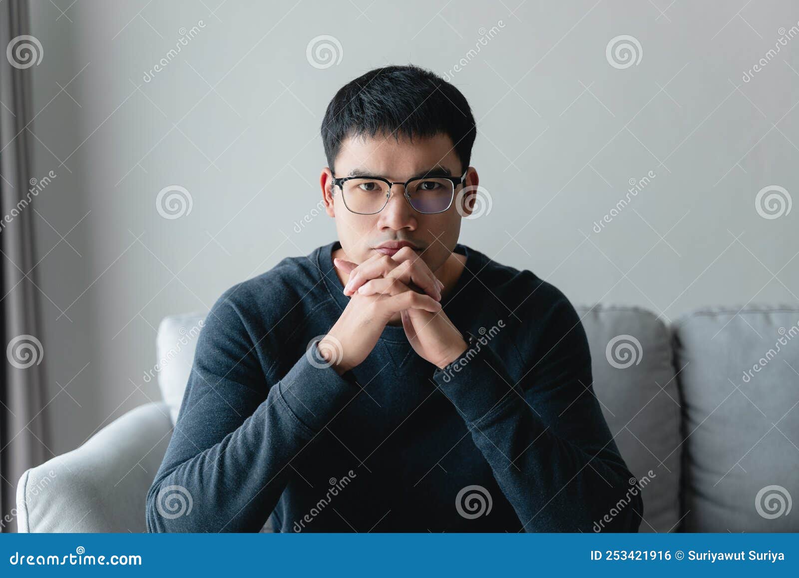 Pensive Thoughtful Serious Asian Man in Eyeglasses Thinking for ...