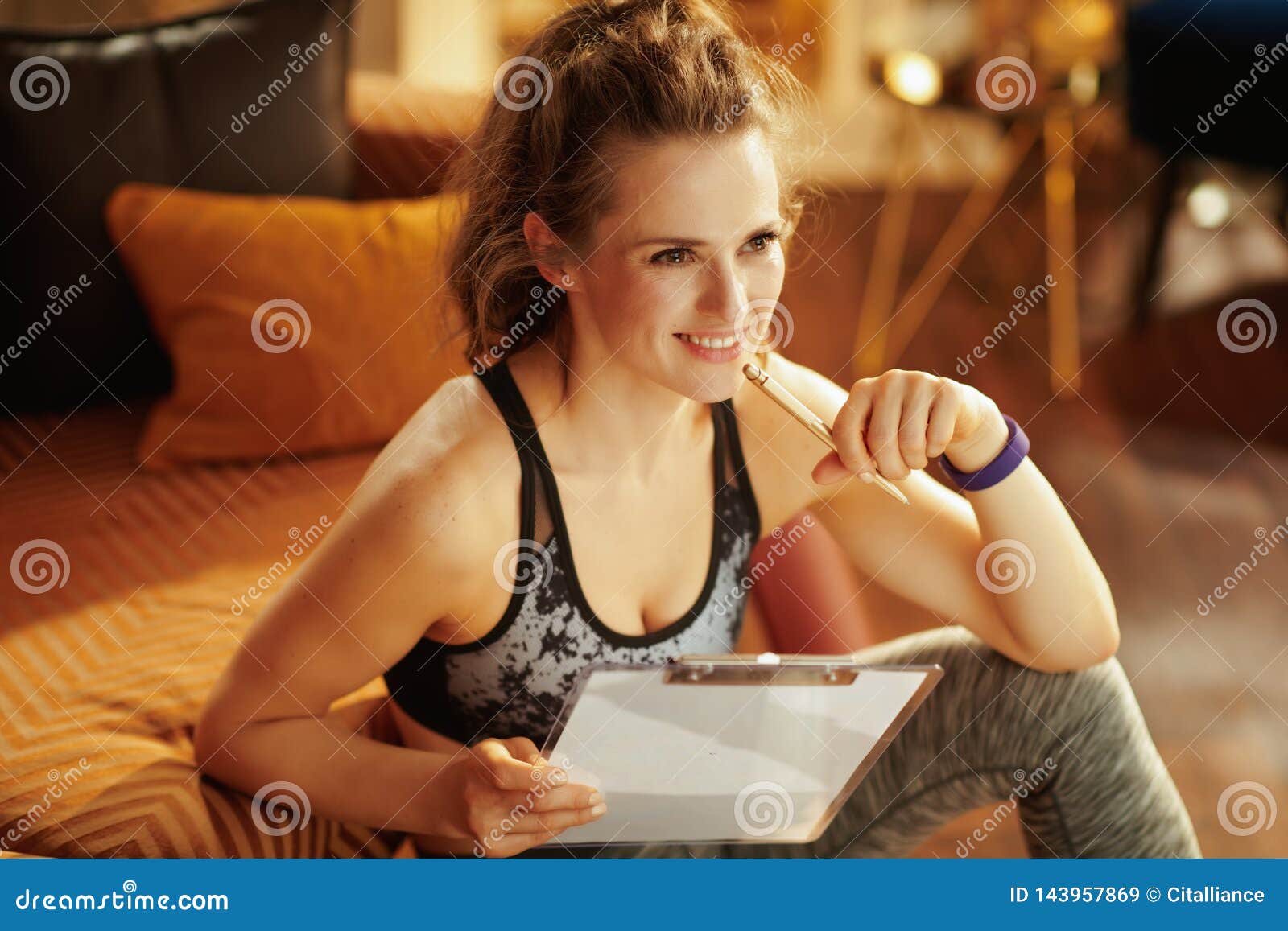 Pensive Woman with Clipboard and Pen Doing Sport Planning Stock Image ... Pensive Woman with Clipboard and Pen Doing Sport Planning Stock Image ...