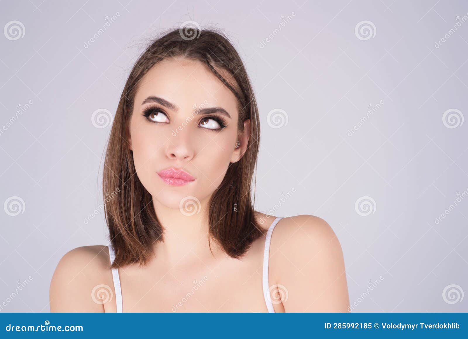 Pensive Woman Isolated on Studio Background Thinking. Thoughtful Woman ...